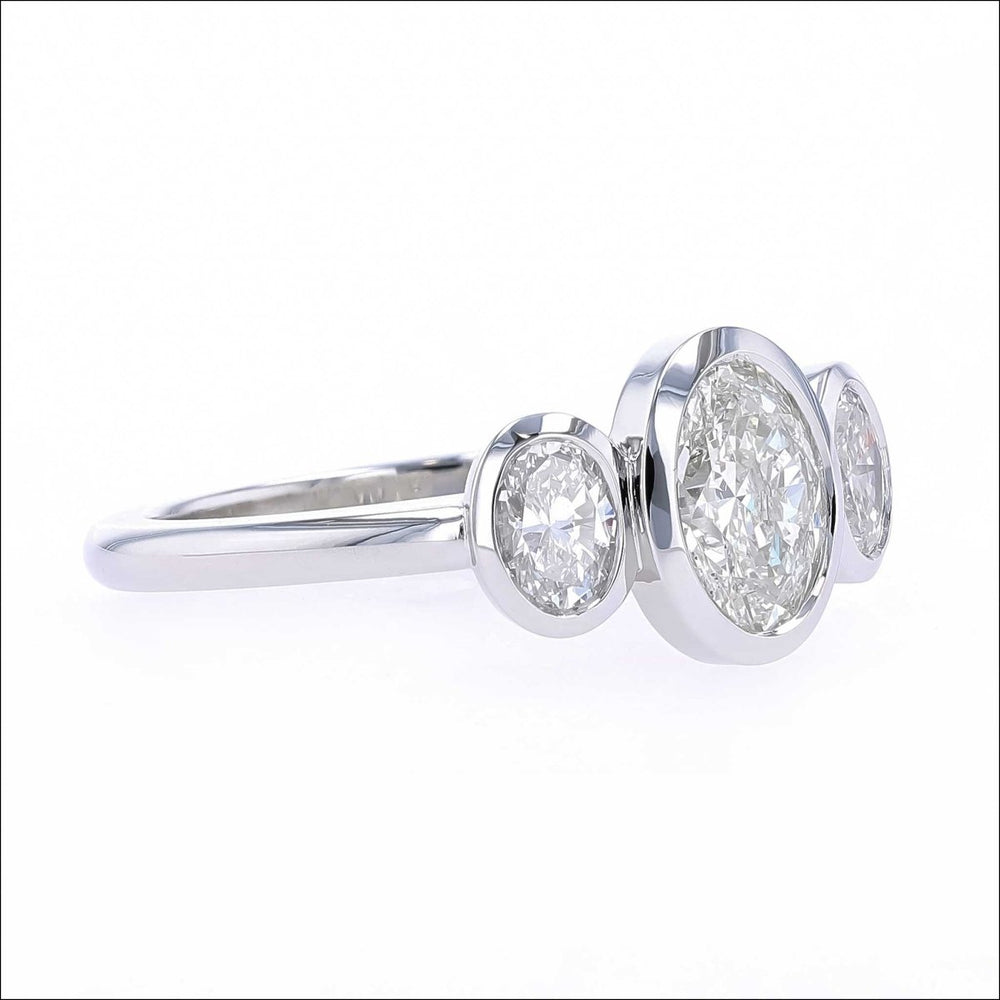 3-Stone Oval Diamond Floating Bezel Engagement Ring Platinum