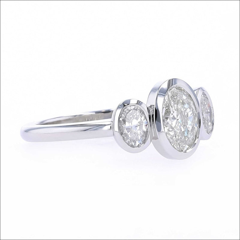 3-Stone Oval Diamond Floating Bezel Engagement Ring Platinum